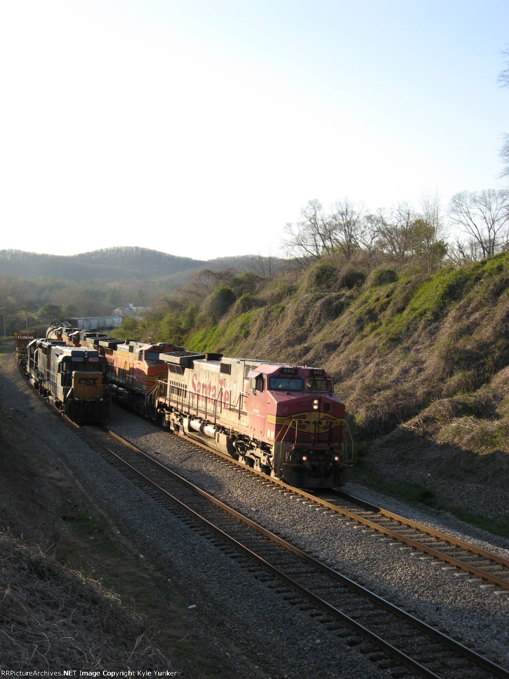 SB freight Q595 passing a welded rail train